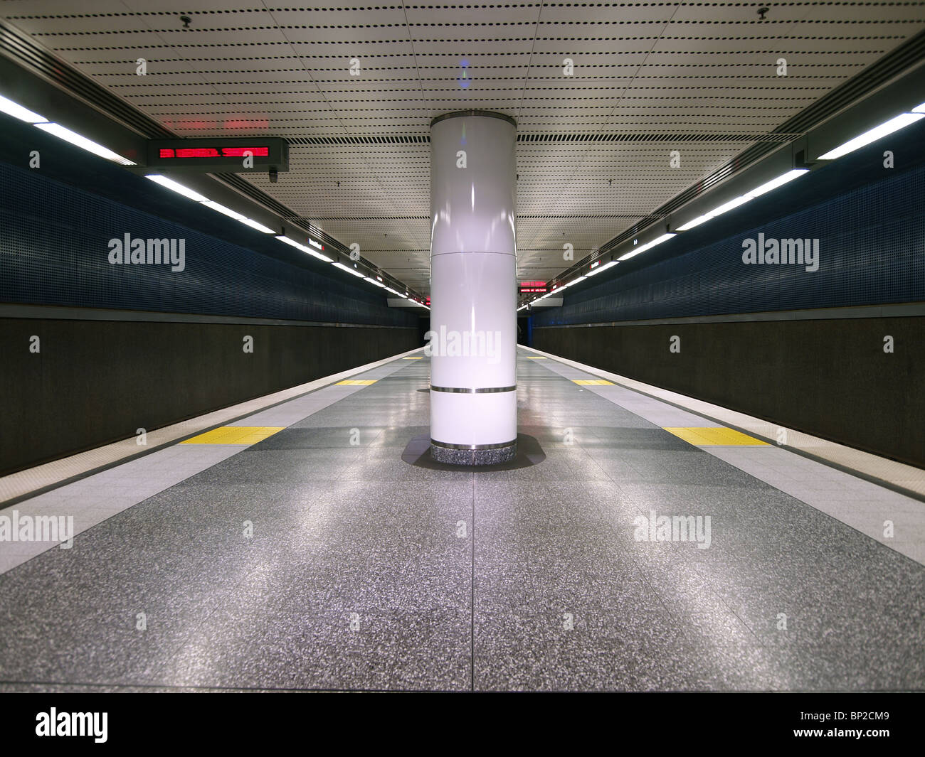 A empty but colorful modern subway platform Stock Photo - Alamy