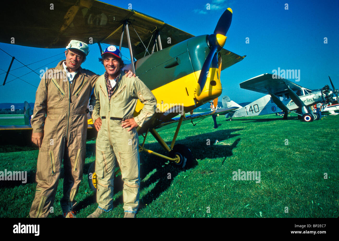 Two friends, pilots at local air show Stock Photo - Alamy