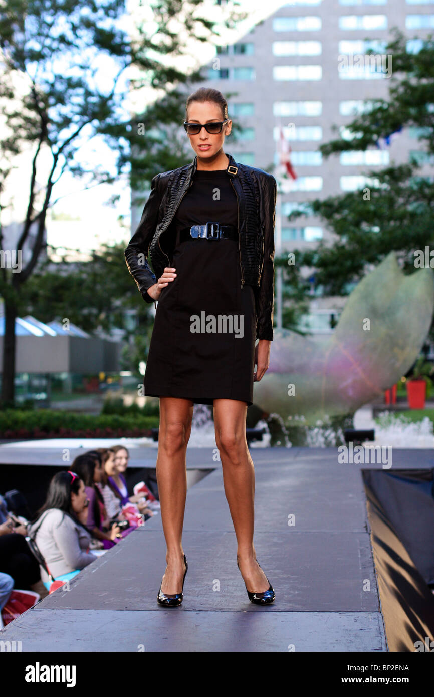 female model catwalk black sunglasses runway Stock Photo - Alamy