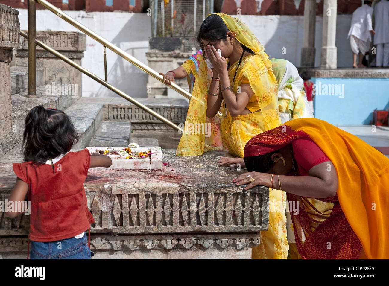 Indian women praying. Shree Jagdish Jain Temple. Udaipur. Rajasthan ...