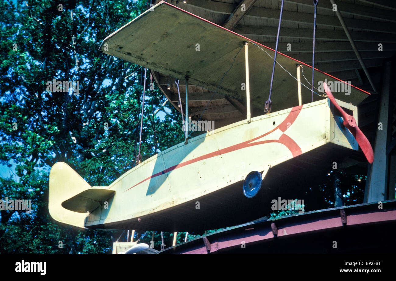 Antique style amusement park flying machine Stock Photo - Alamy