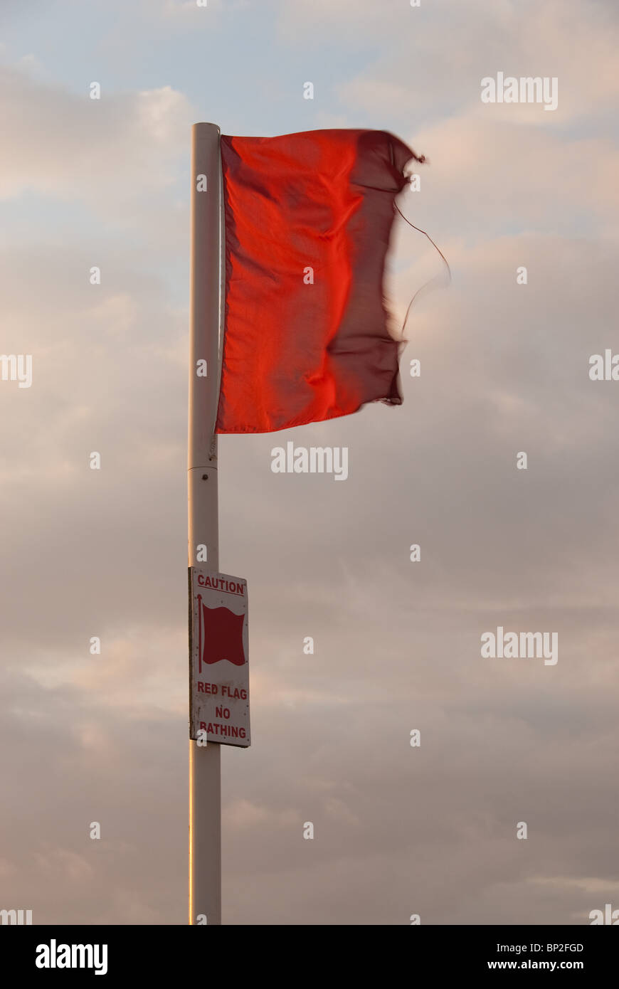 Red danger flag flying hi-res stock photography and images - Alamy