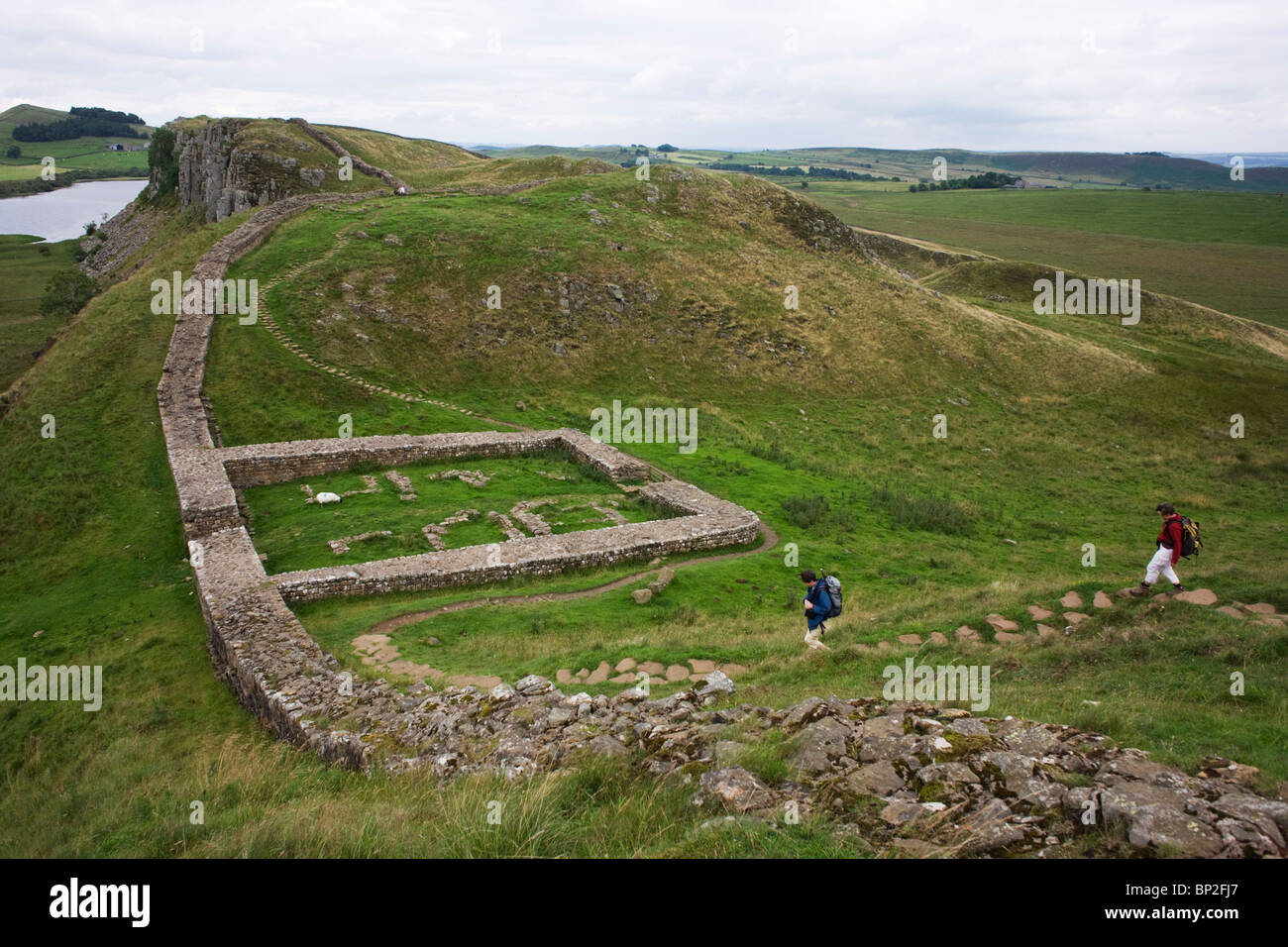 Walkers explore Milecastle 39 on Roman Hadrian's Wall, once the ...