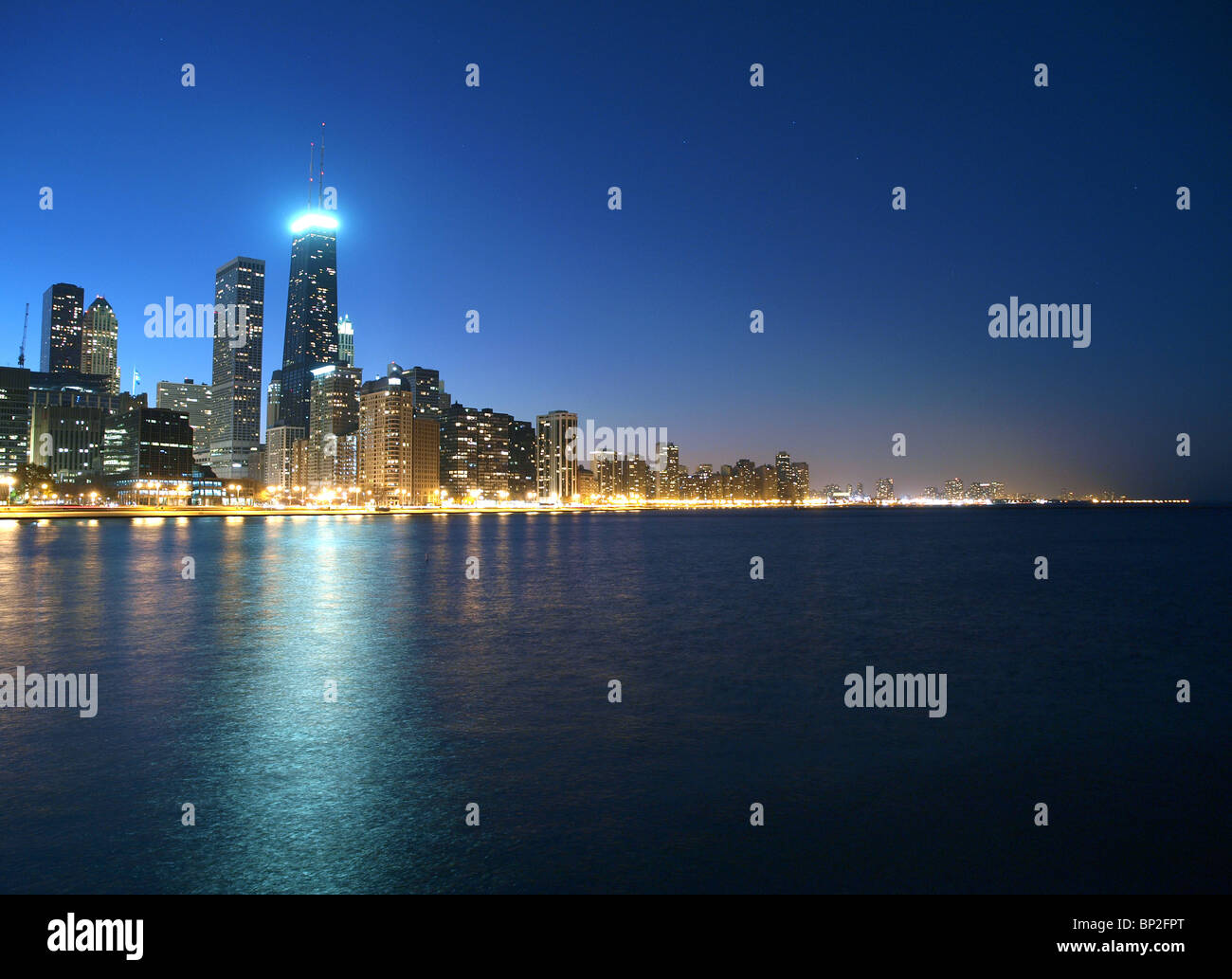 Lake Michigan and tall Chicago towers in evening light Stock Photo - Alamy