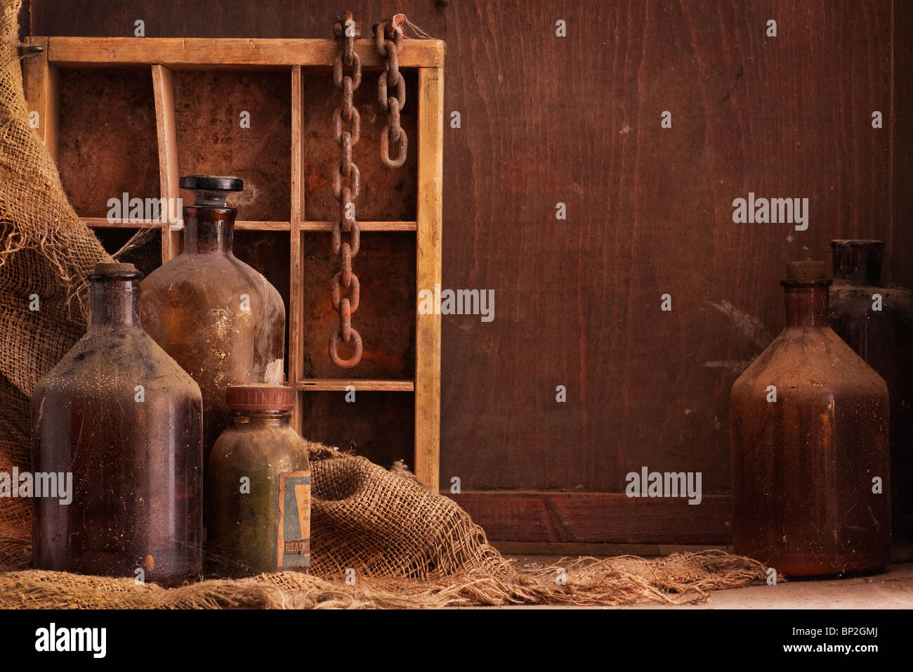 old dusty bottles still life Stock Photo - Alamy