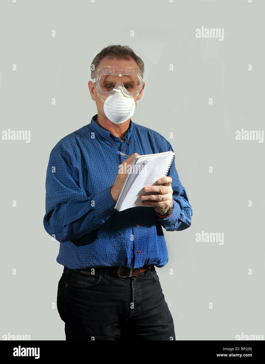 Safety man taking notes Stock Photo - Alamy