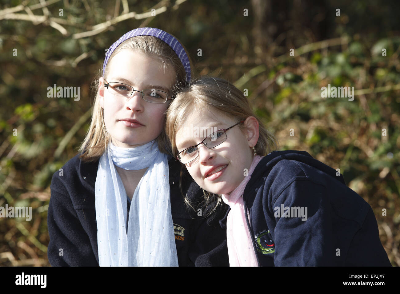 Portrait of two sisters Stock Photo - Alamy