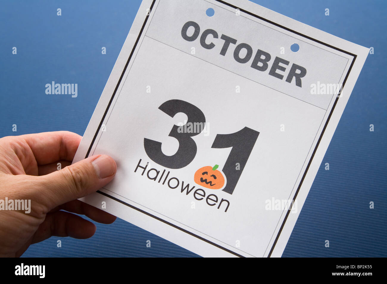 Halloween, calendar October 31 with blue background Stock Photo - Alamy
