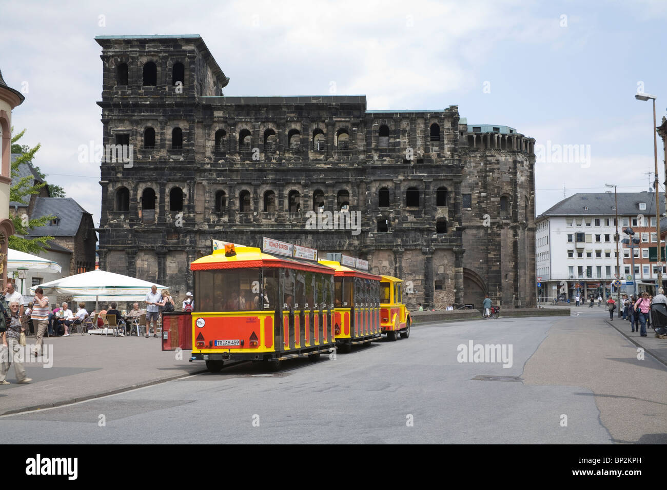 Trier Germany Europe EU City tour train parked in front of Porta Nigra ...