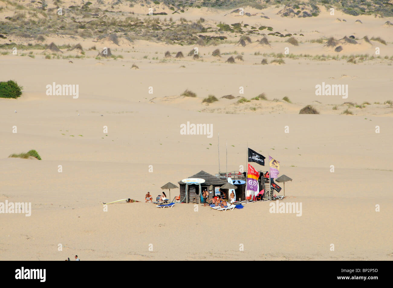 A beach stall apparently lost in the middle of the desert, on a beach ...