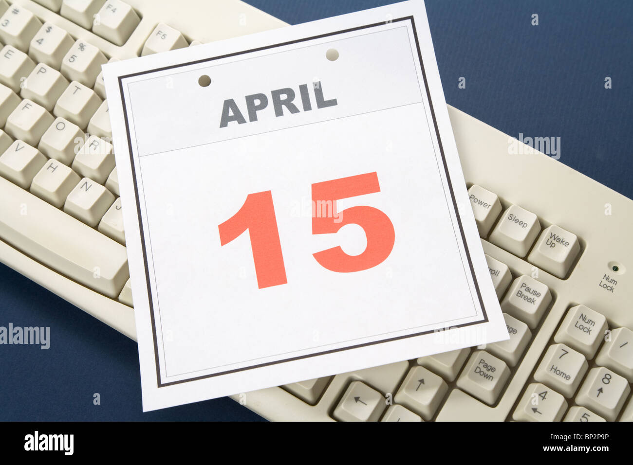 Tax Day, calendar date April 15 and keyboard for background Stock Photo ...