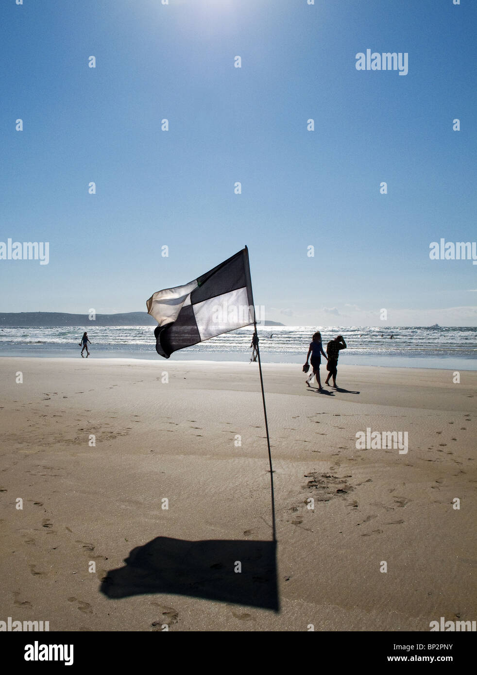 A lifeguard flag on Gwithian Beach in Cornwall. Photo by Gordon ...