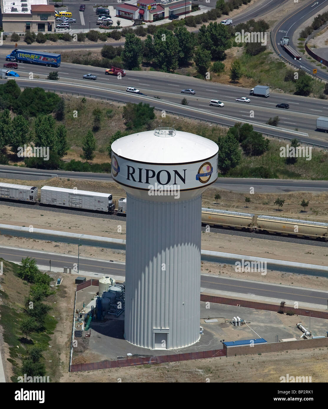 aerial view above water tower highway 99 VeraSun railorad cars Ripon ...
