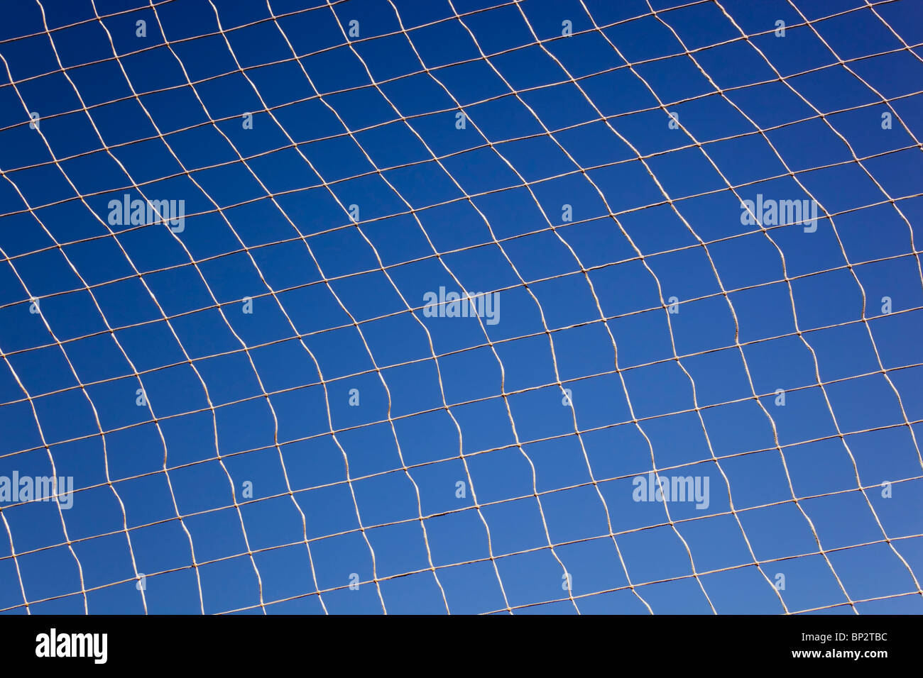 pattern created by string netting against a blue sky Stock Photo - Alamy