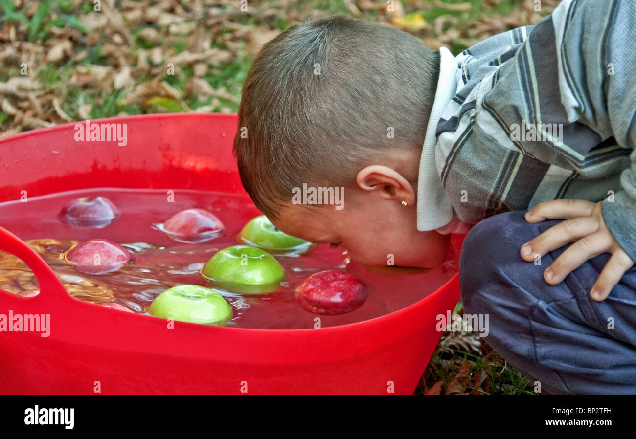 Boy Bobbing For Apples High Resolution Stock Photography and Images - Alamy