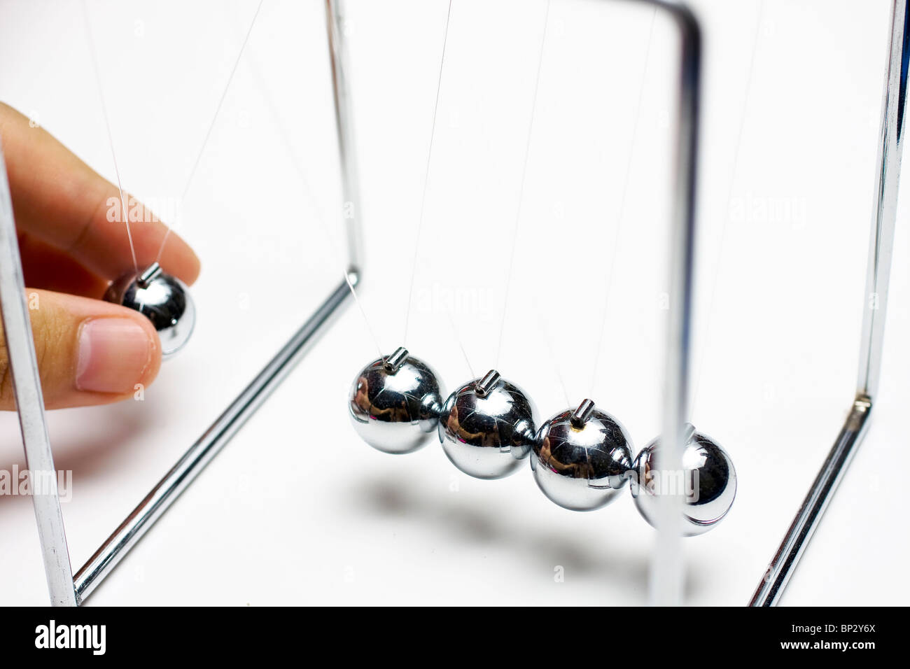 Newtons cradle balance balls hi-res stock photography and images - Alamy