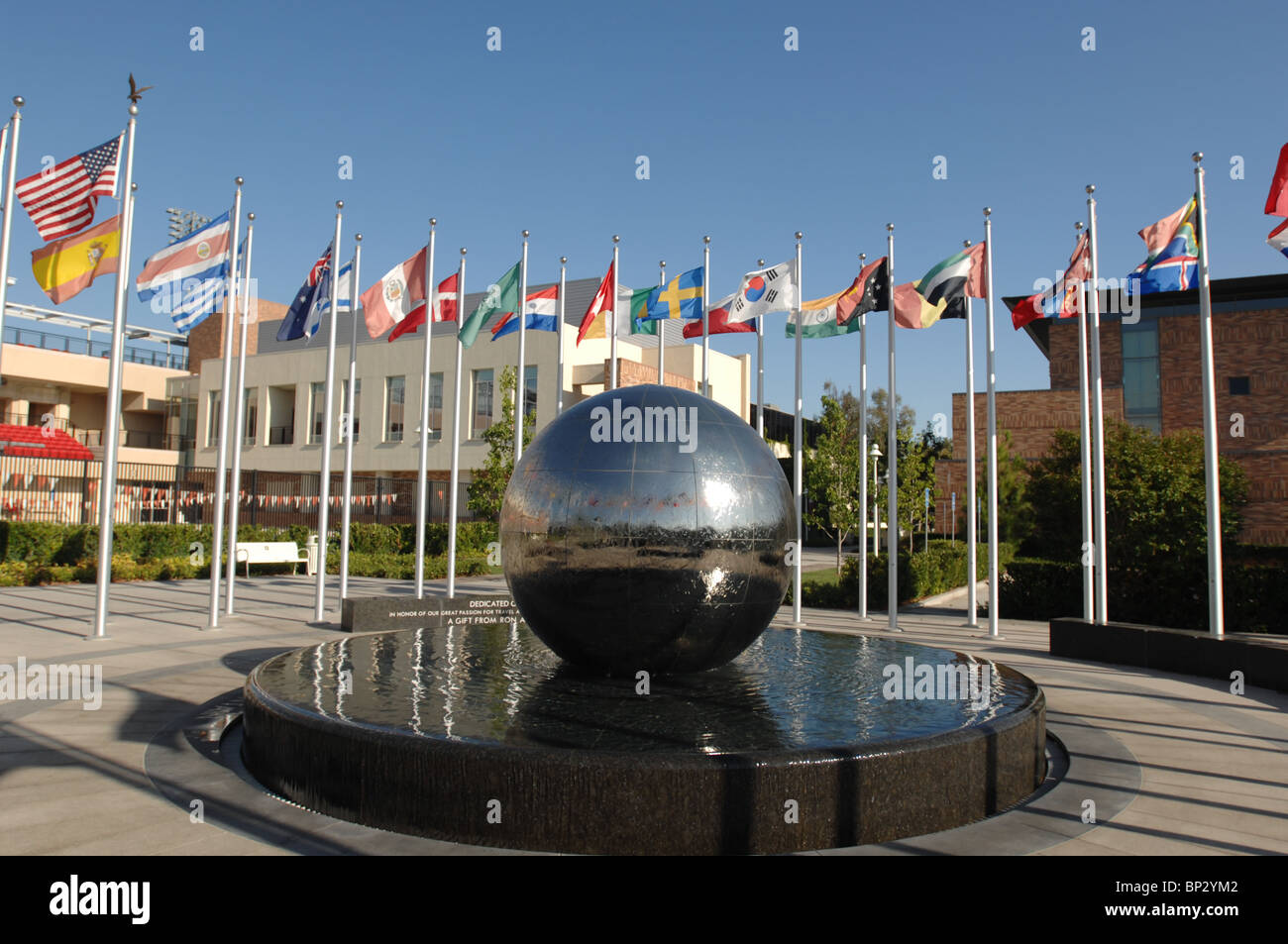 Chapman University's Global Citizen's Plaza Fountain with flags of many ...