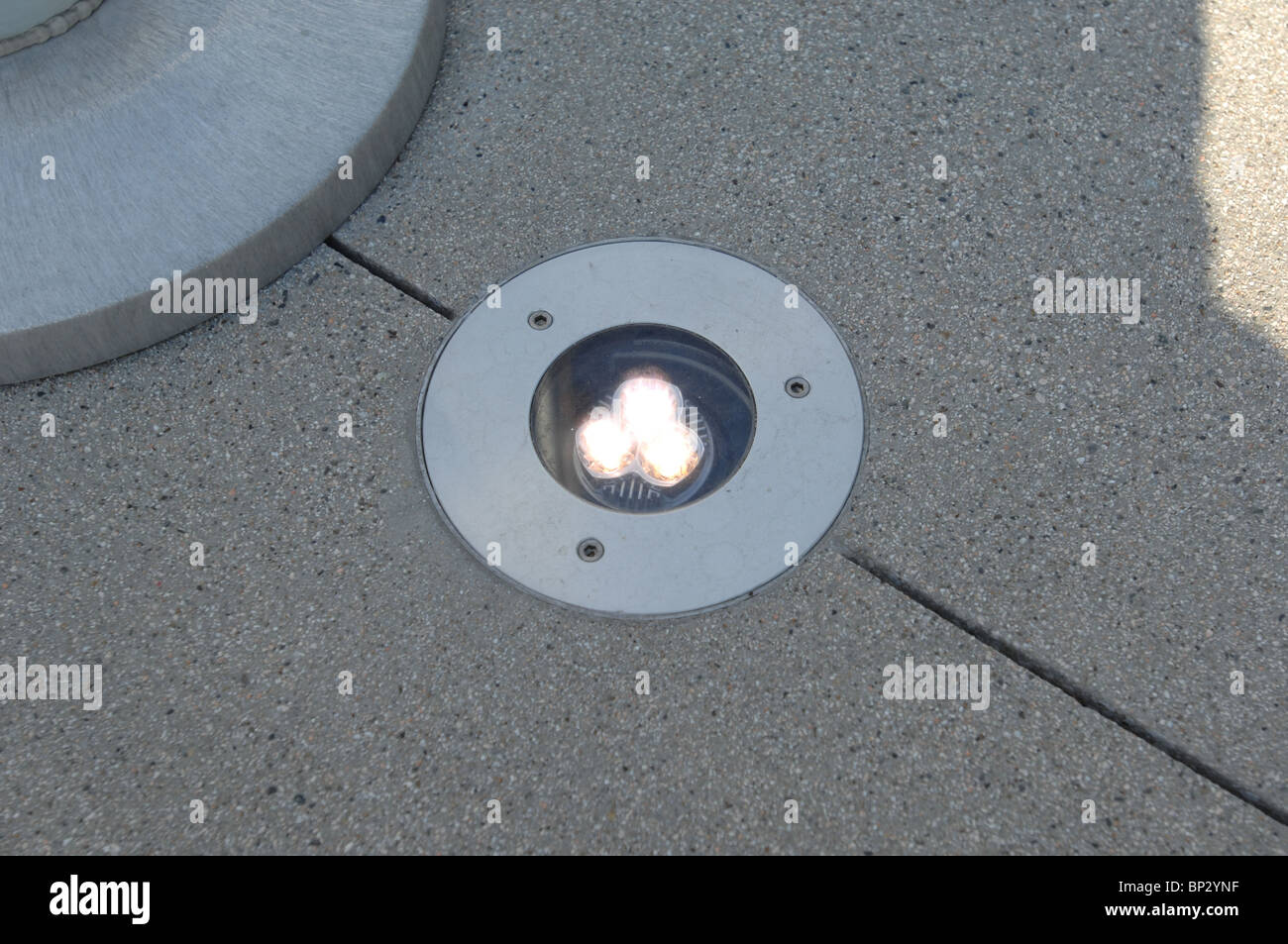 LED lighting embedded in the floor to illuminate a flag high overhead ...