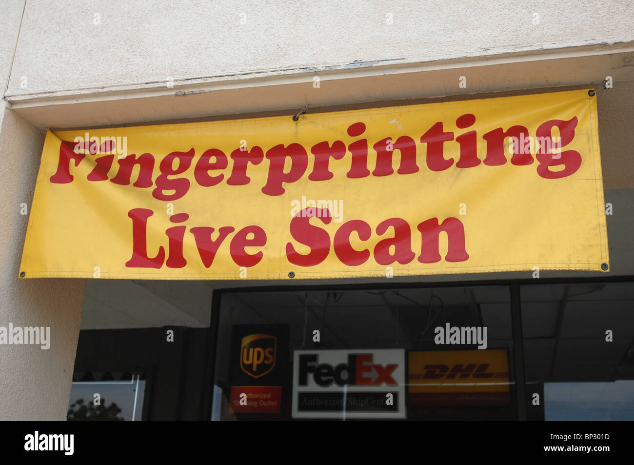 Fingerprinting - Live Scan sign posted at a mailbox and postal annex ...