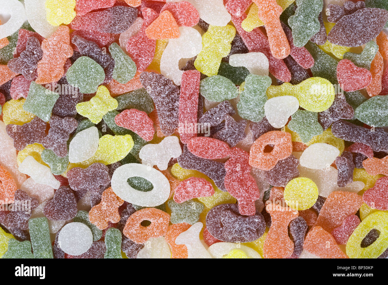 Assorted multi Colored sour sweets background Stock Photo - Alamy
