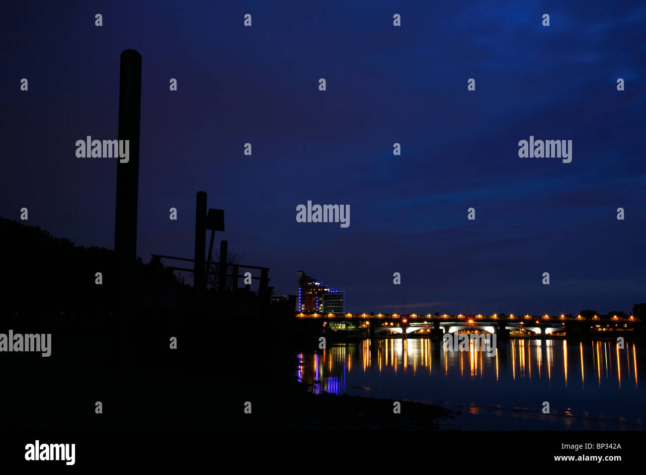 Looking upstream the River Thames to Fulham Rail Bridge and Putney ...