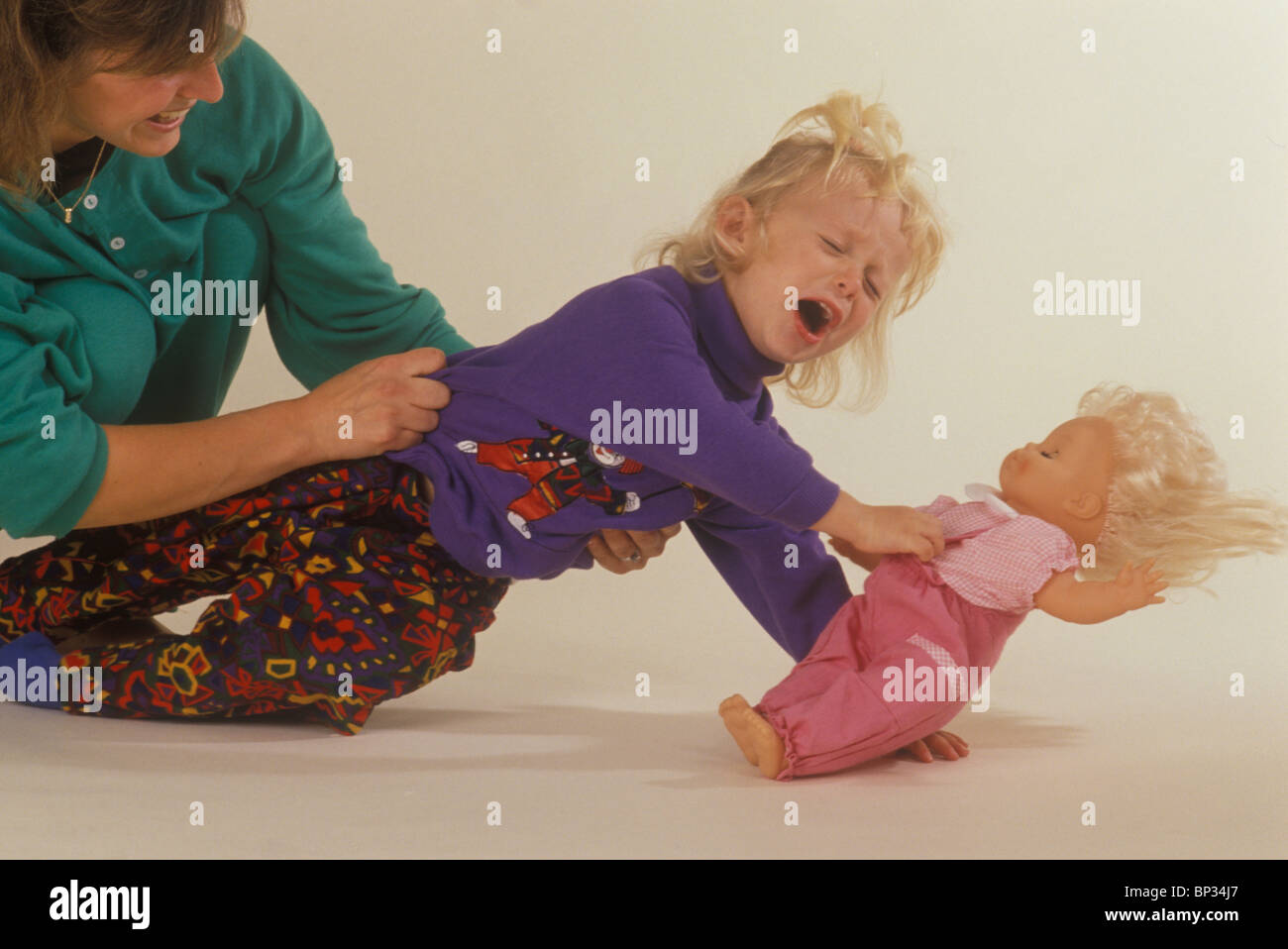 Restraining a child hi-res stock photography and images - Alamy