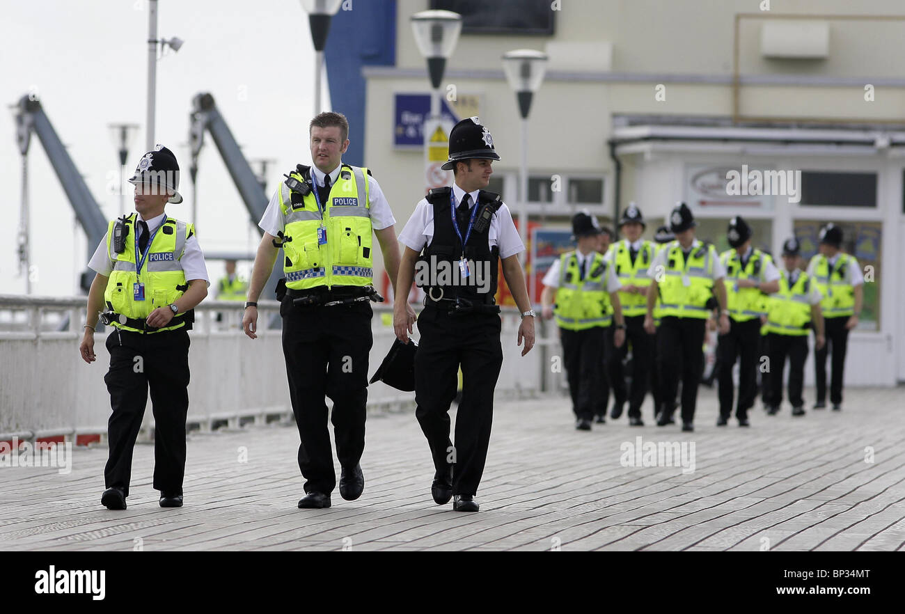 Police officers walk along Bournemouth Pier prior to the Labour Party ...