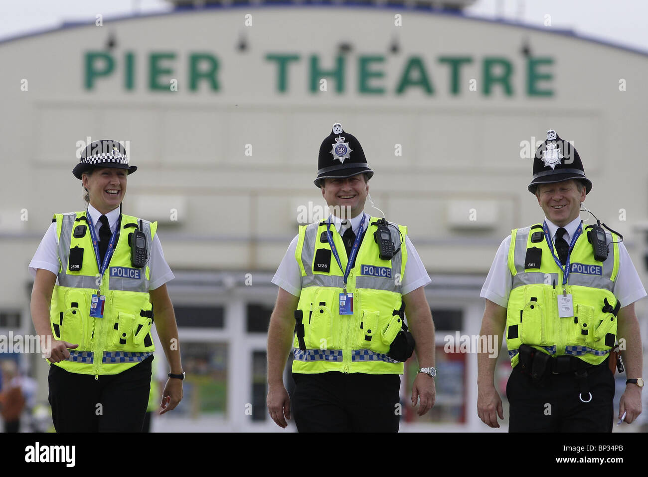Police officers walk along Bournemouth Pier prior to the Labour Party ...