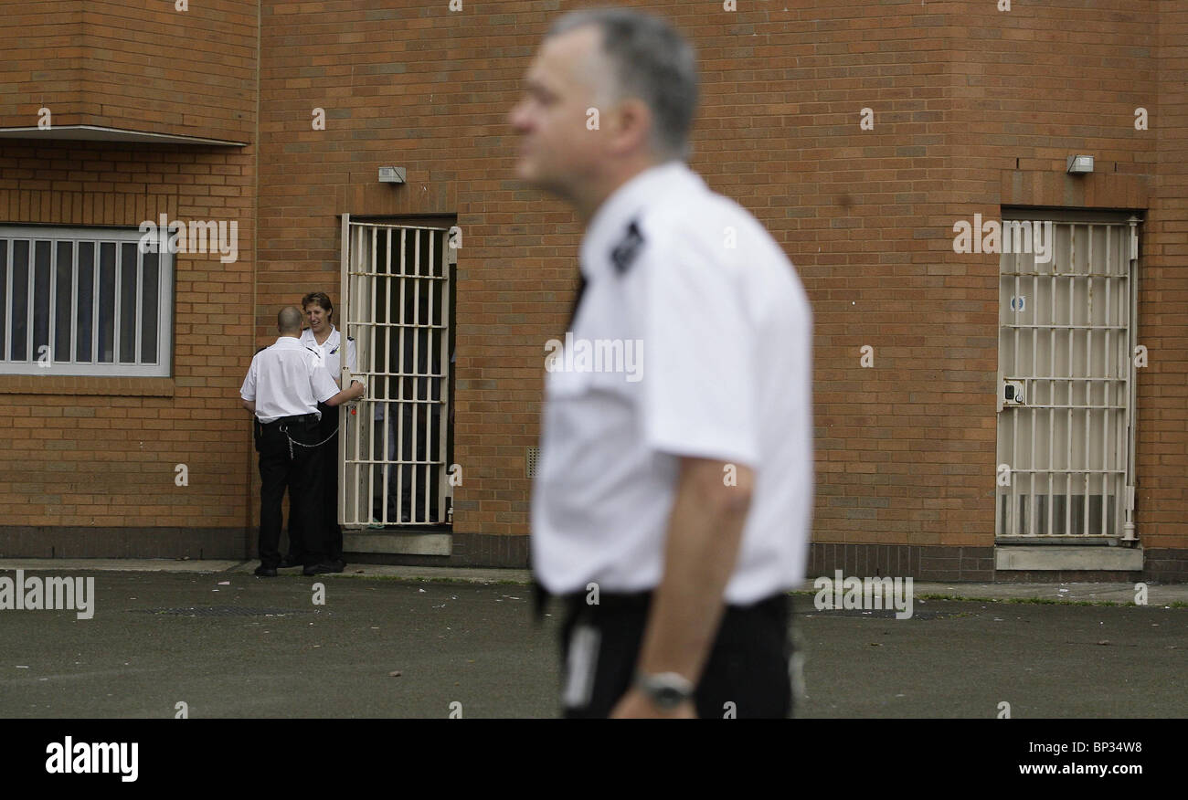 Prison Officers in the exercise yard at HM Prison Woodhill. Picture by ...