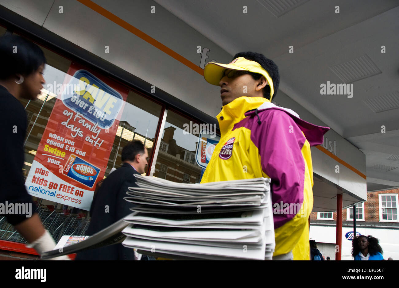 Handing out newspaper hi-res stock photography and images - Alamy