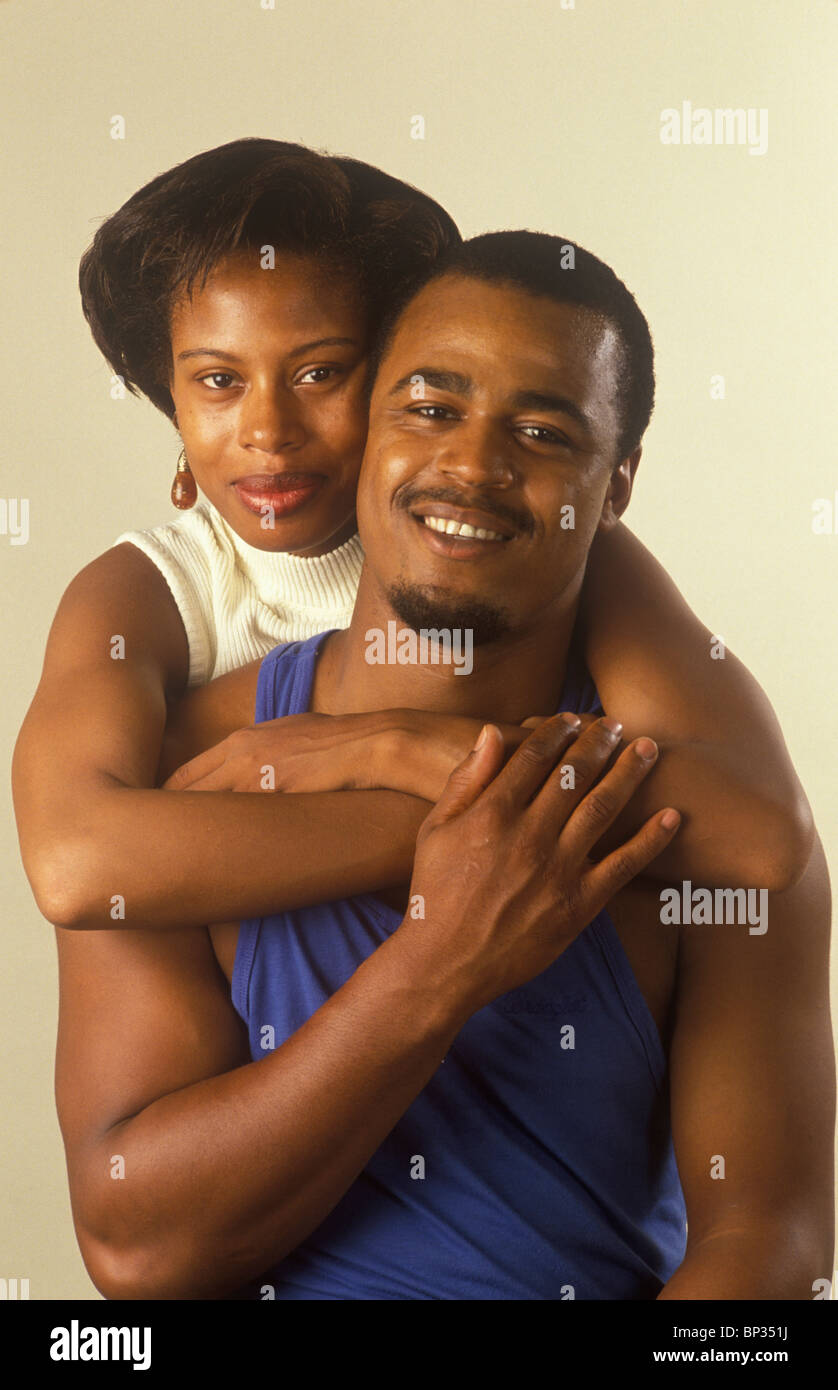 Smiling couple looking at camera hi-res stock photography and images ...