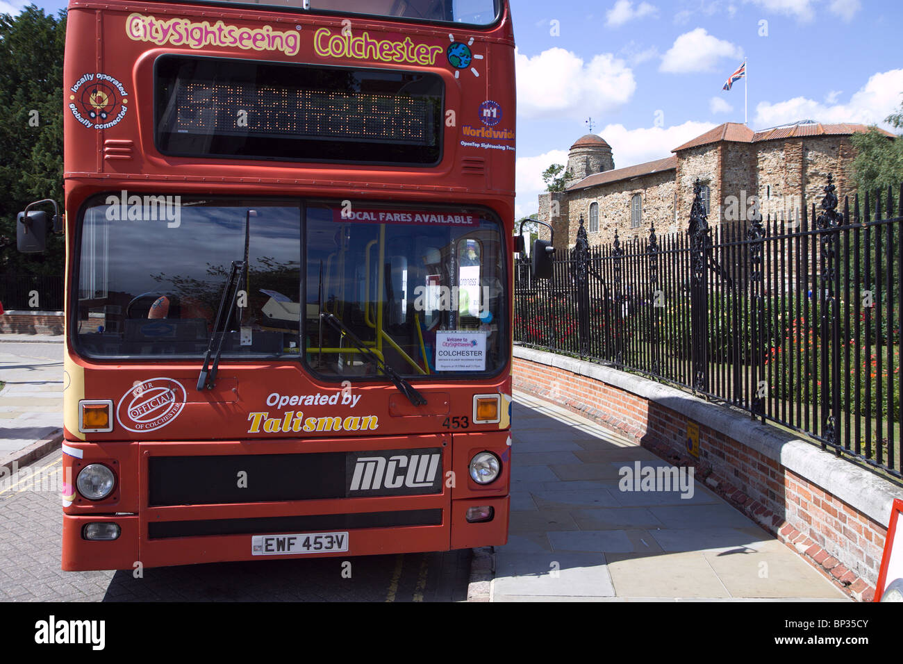 Colchester's open top tour bus parked outside Colchester Castle Stock ...