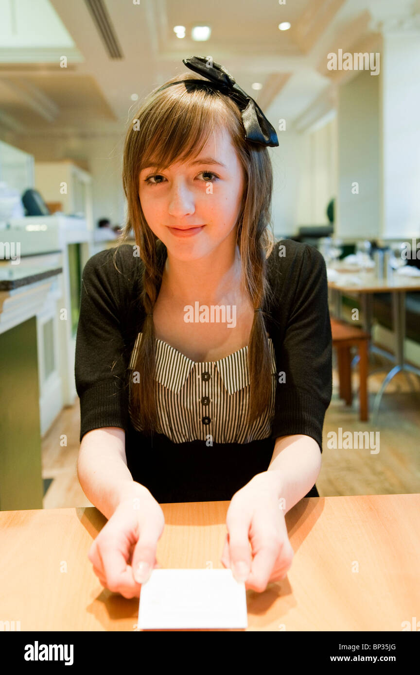 Rebecca Flint AKA Beckii Cruel showing her meishi (business card Stock ...