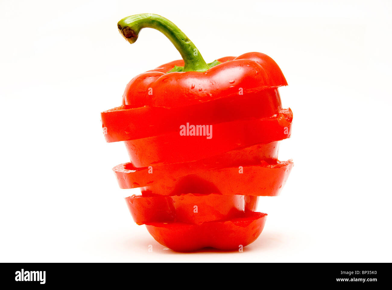red sweet pepper cut in horizontal slices Stock Photo - Alamy