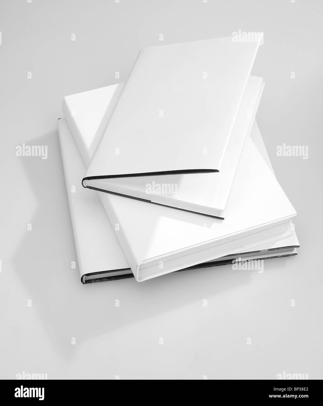 Three Blank book cover white Stock Photo - Alamy