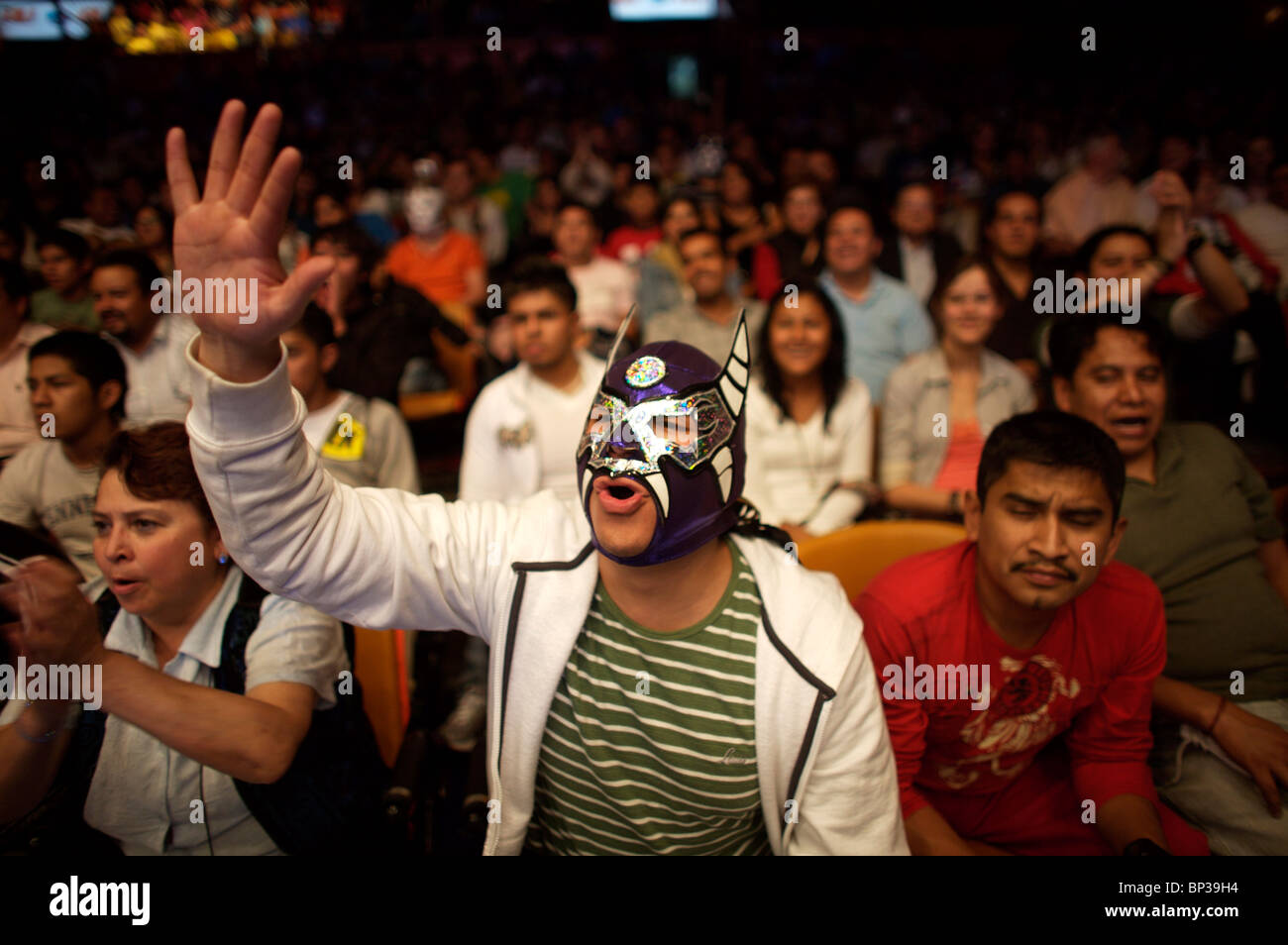 A fan gestures at a Lucha Libre Wrestling show at Arena Mexico in ...