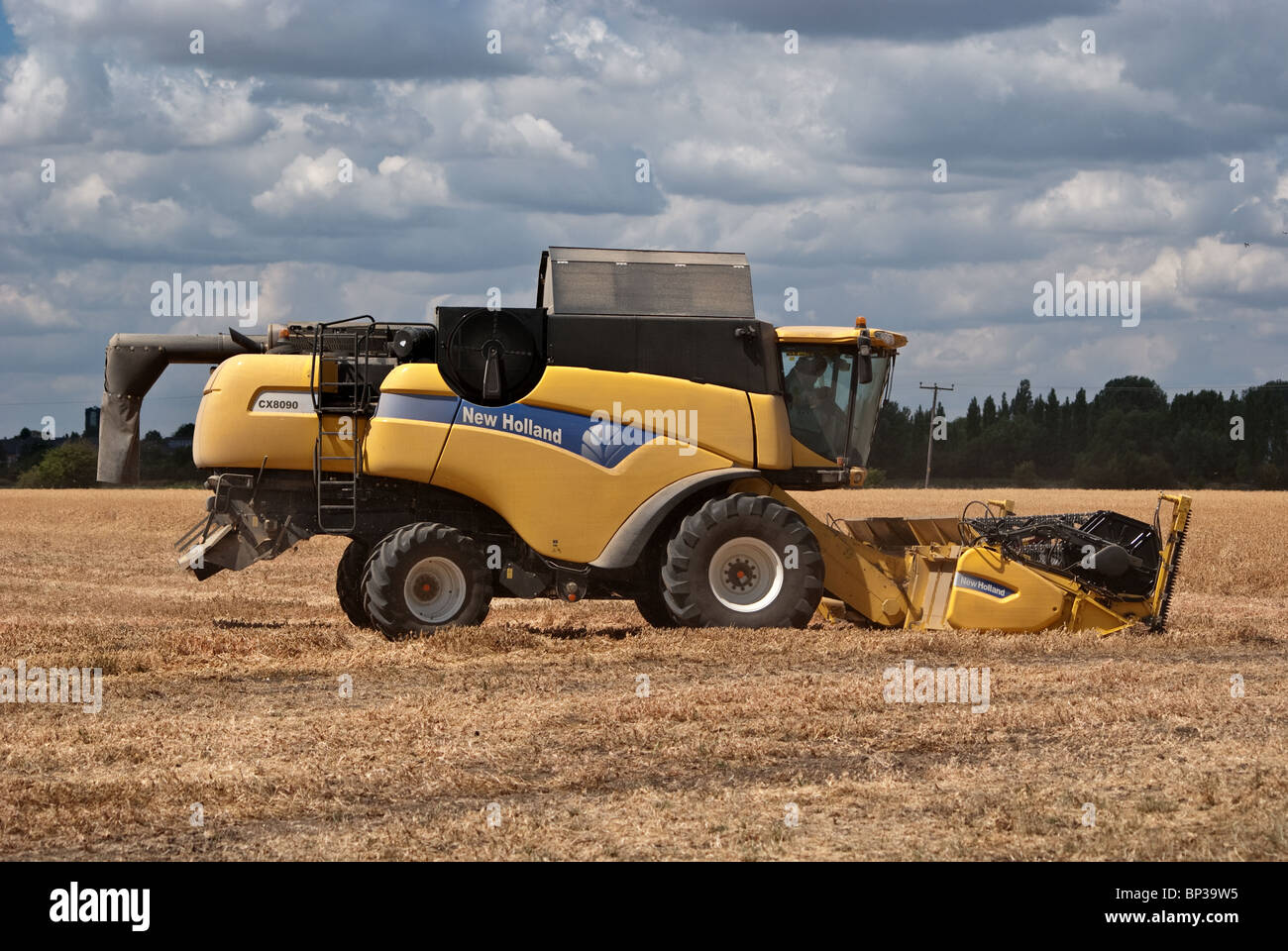 Yellow combine harvester hi-res stock photography and images - Alamy