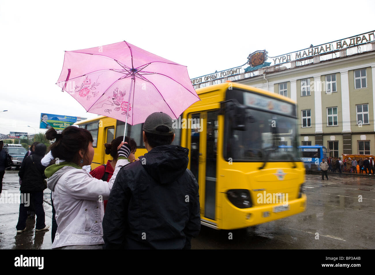 Young people boarding a bus, Ulan Baator, Mongolia Stock Photo - Alamy