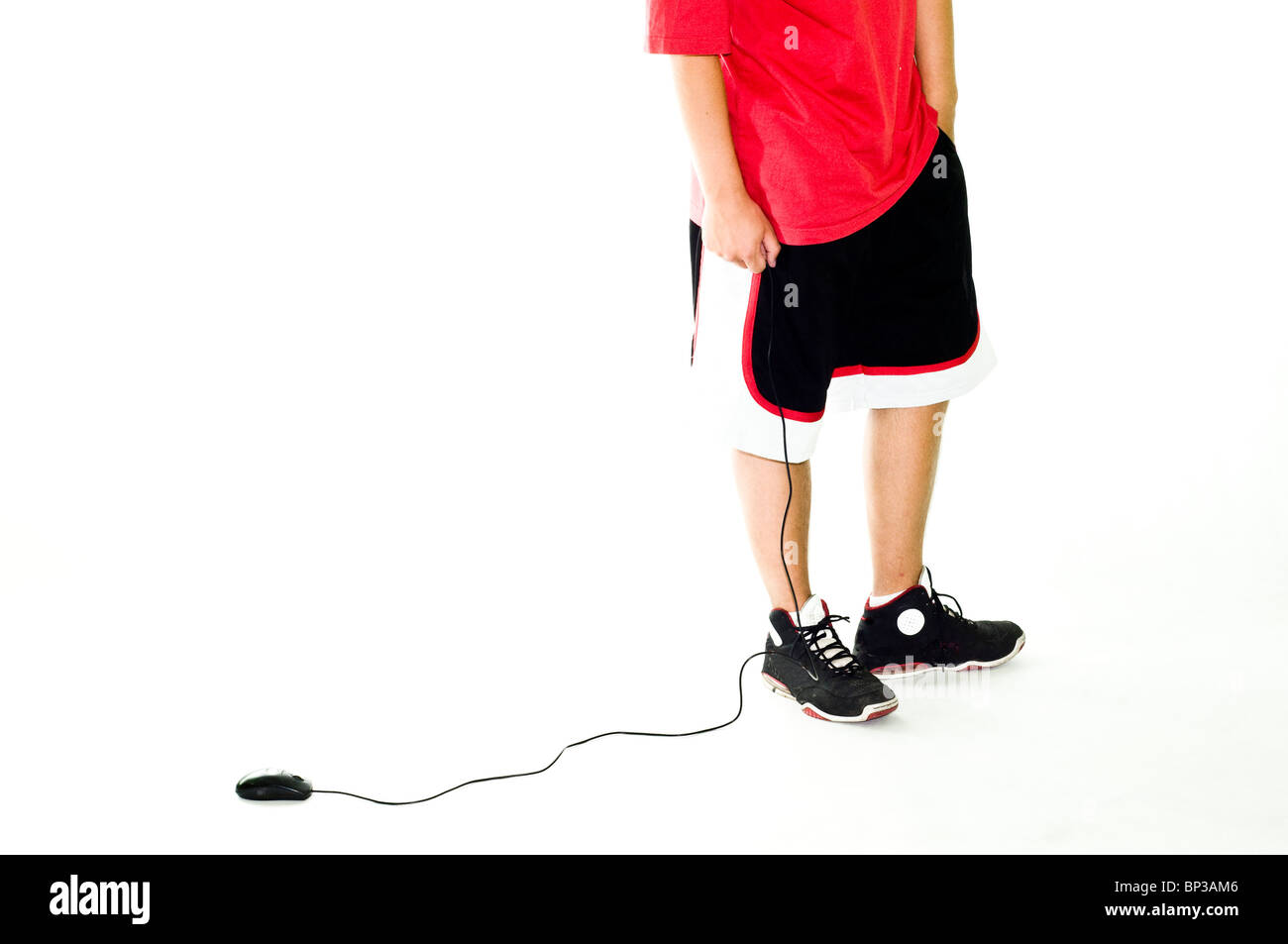 Young man with mouse - "walking" the mouse, funny concept, idea ...