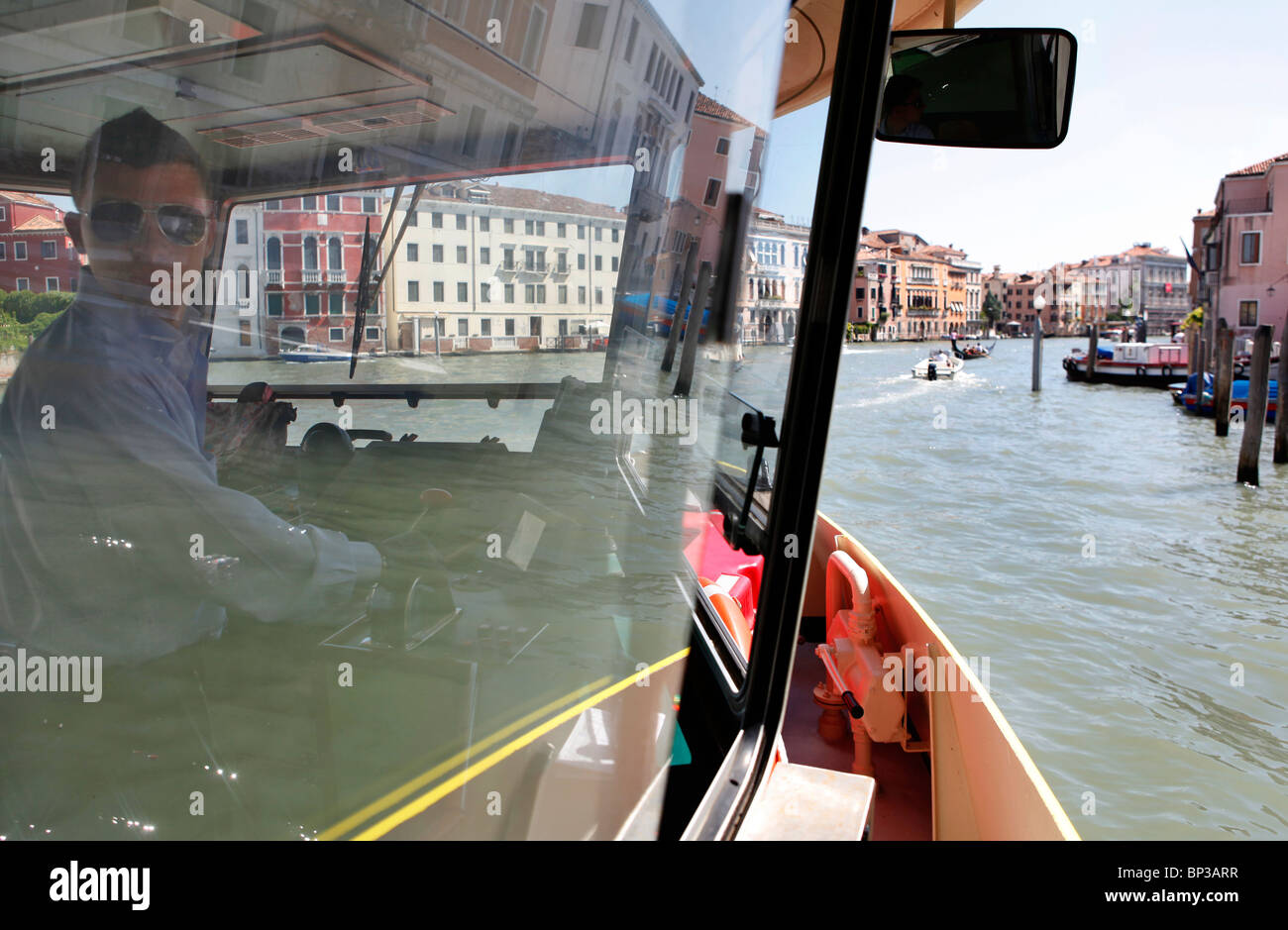 Venice water taxi driver hi-res stock photography and images - Alamy