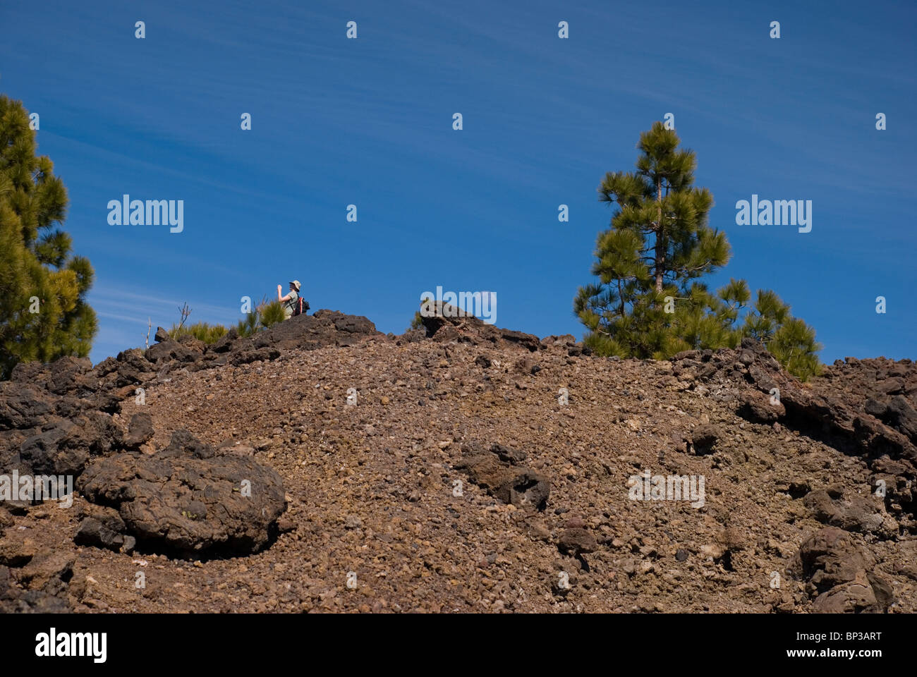Moon rises behind the volcanic cliff Stock Photo - Alamy