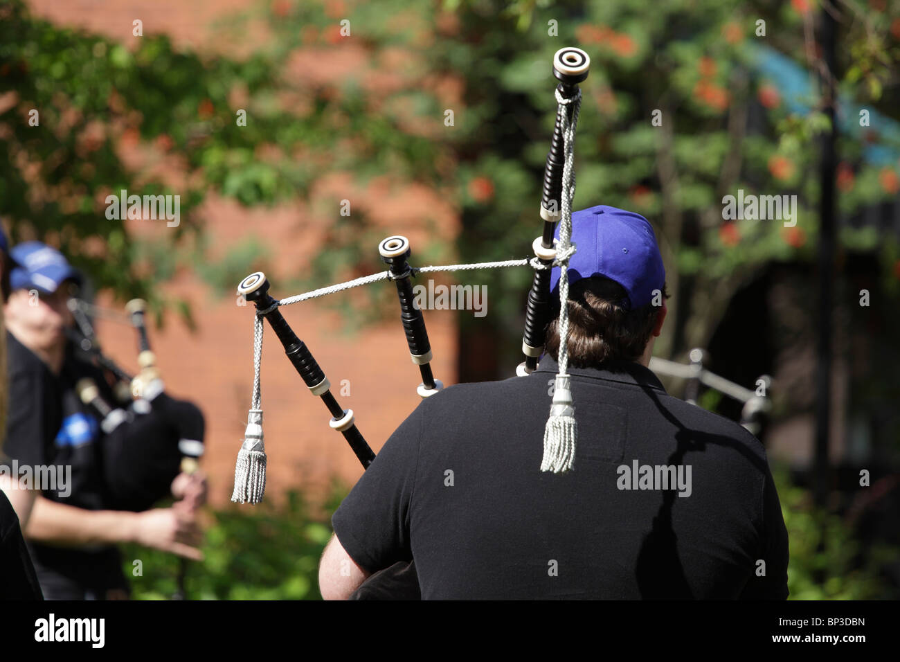 Pipe band practicing outdoors, UK Stock Photo - Alamy