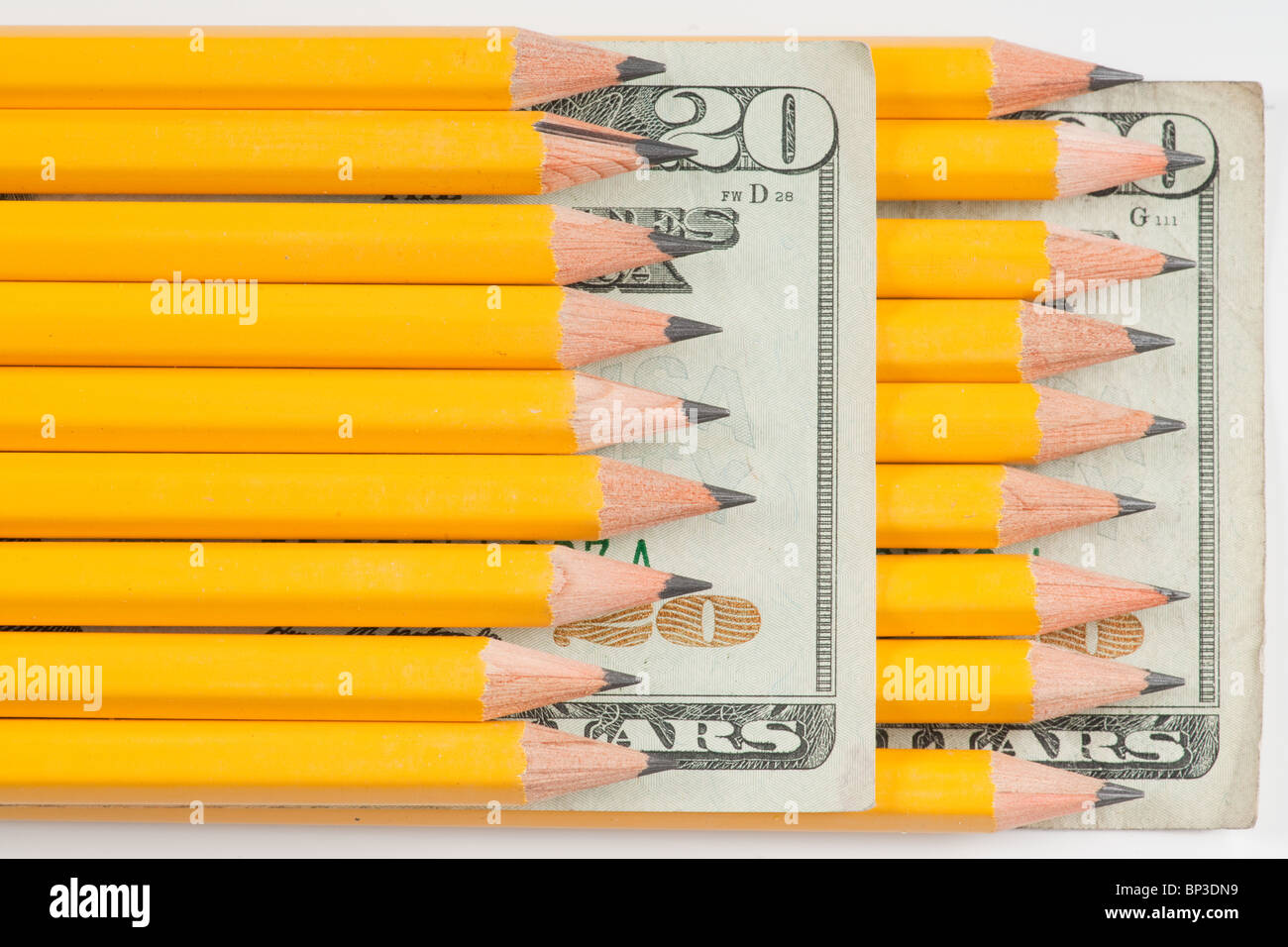 Box of pencils and paper money Stock Photo - Alamy