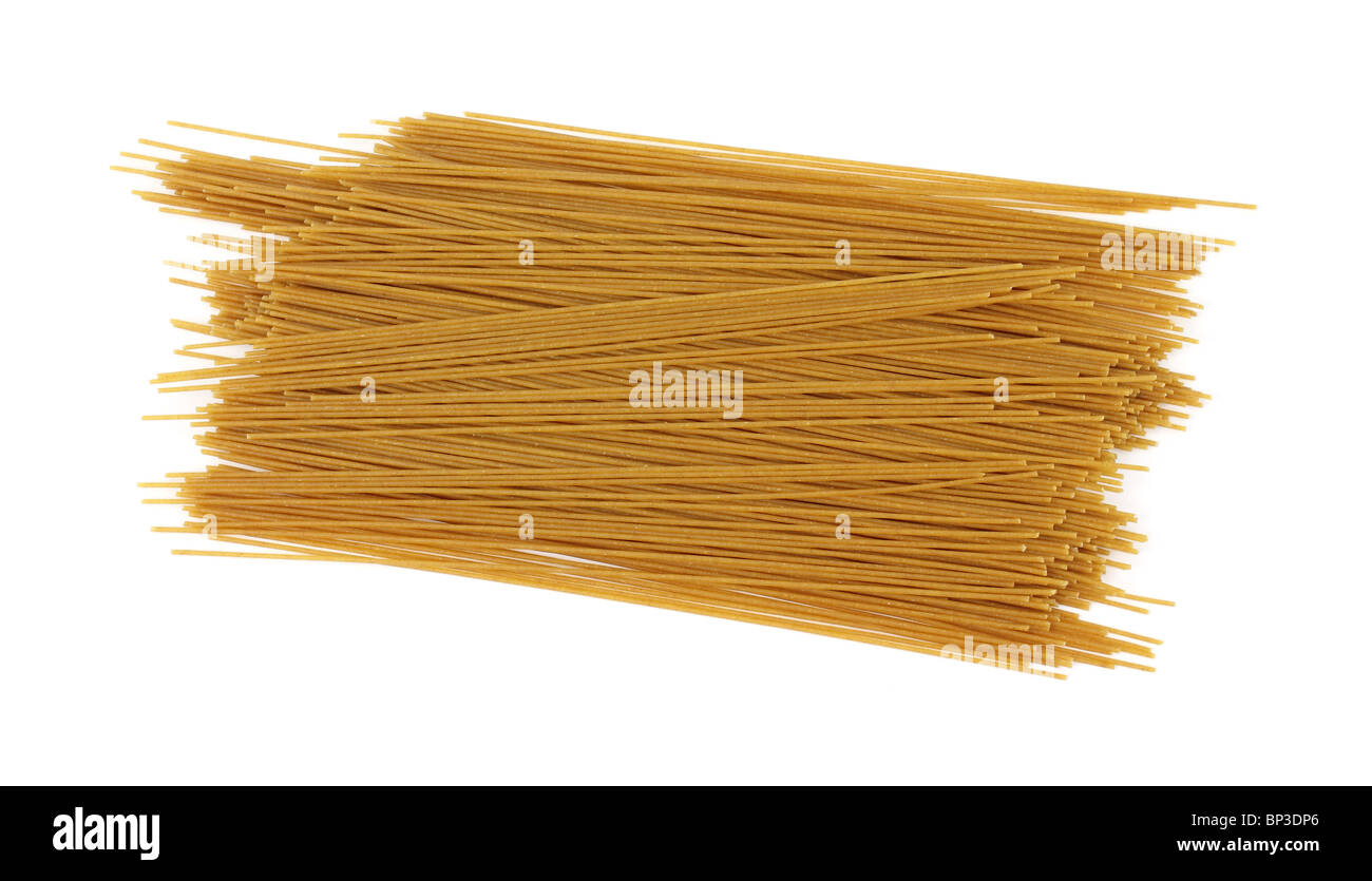 Whole wheat spaghetti on white background Stock Photo - Alamy