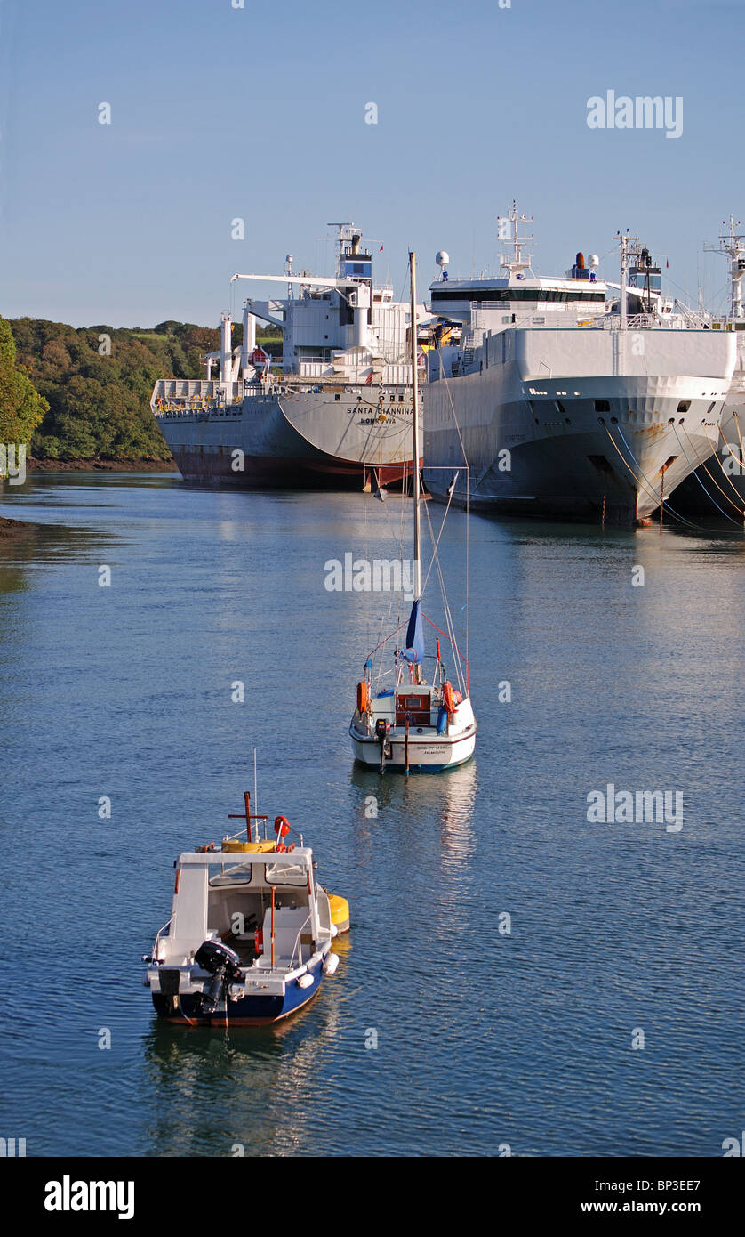 cargo ships laid up in deep water on the river Fal near Truro in ...