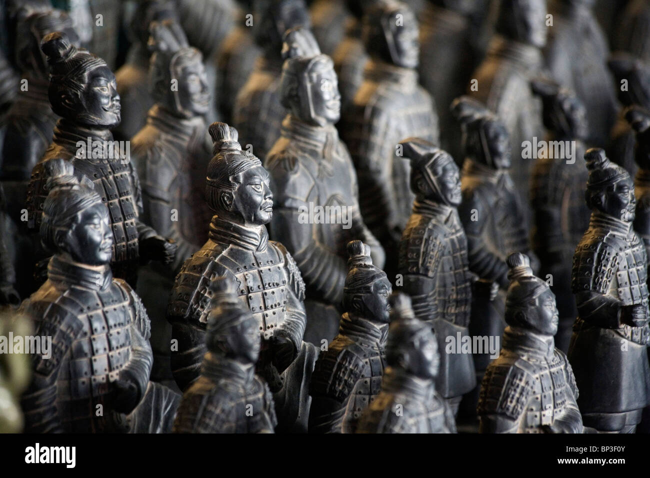 Life-size Imperial terra cotta warriors in battle formation stretch ...