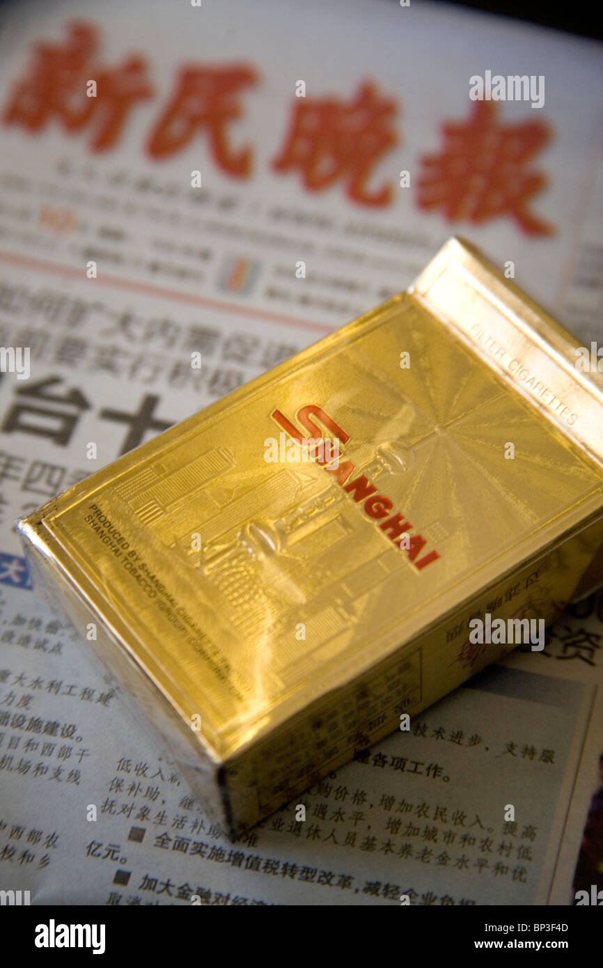 Gold embossed pack of Shanghai cigarettes featuring futurist Pudong ...
