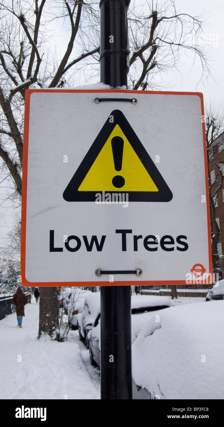 Sign warning London bus drivers of low trees along route, London ...