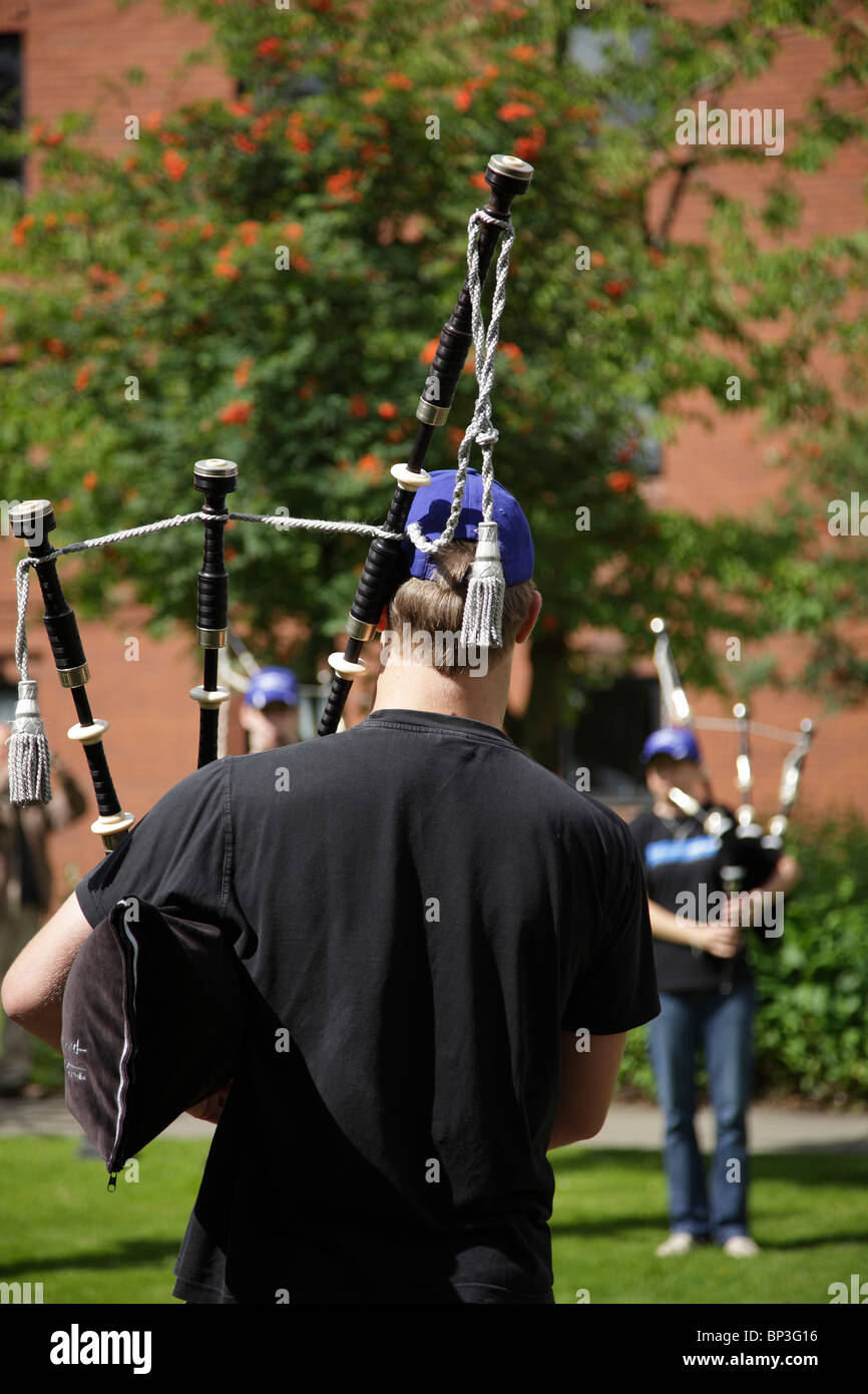 Pipe band practicing outdoors, UK Stock Photo - Alamy