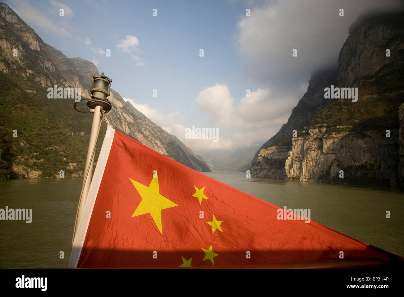 Chinese flag astern as passes through a Yangzi gorge.Chinese flag and ...